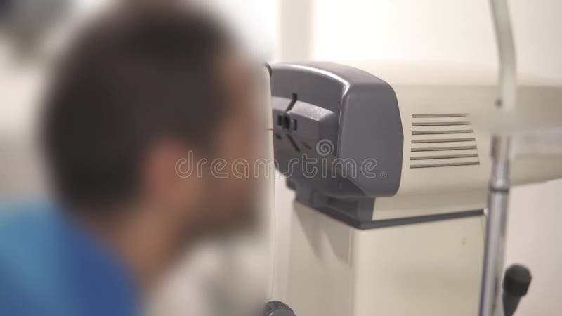 Checking Vision with Optician Machine, Loopable Stock Footage - Video ...