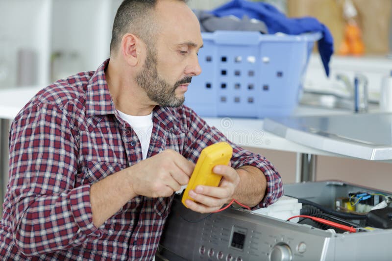 Checking voltage machine stock photo. Image of production - 286823394