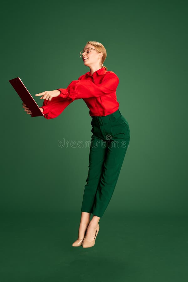 Checking Working Tasks. Young Beautiful Girl in Stylish Clothes Looking ...