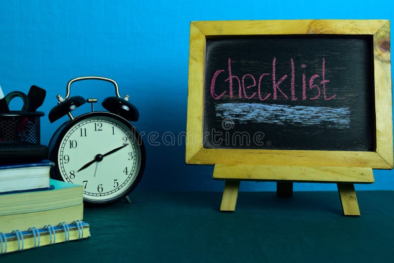 Checklist Planning on Background of Working Table with Office Supplies ...