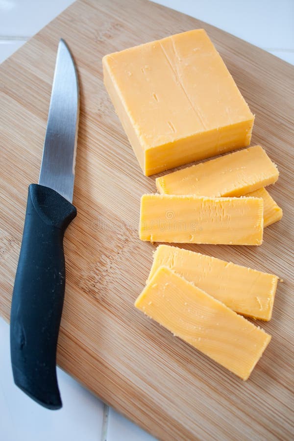 Cheddar Cheese Block and Slices Stock Photo - Image of cube, fish: 35627904