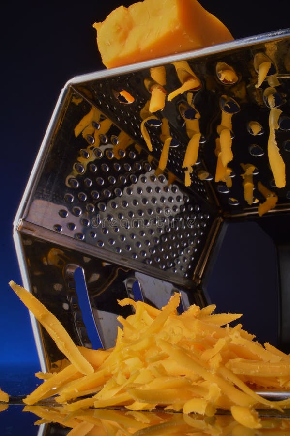Cheese Grater with Grated Cheese Stock Image - Image of shreds, kitchen ...