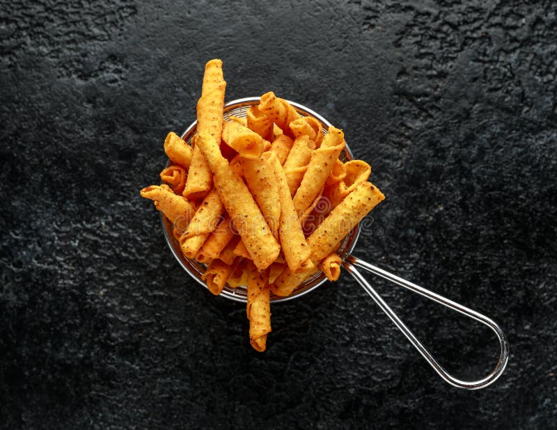 Cheddar Cheese Tortilla Rolls, Chips in Serving Basket Stock Photo ...