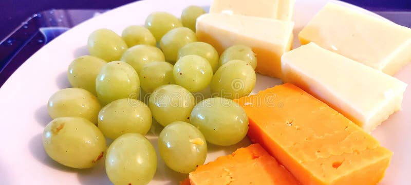 Cheddar and Redlester Cheese with Green Grapes Stock Photo - Image of ...
