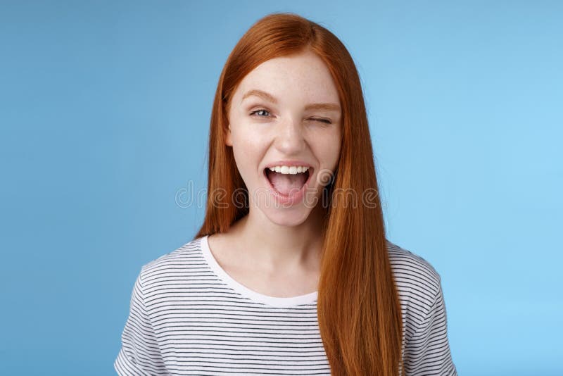 Cheeky Good Looking Flirty Young Gorgeous Redhead Girlfriend Winking