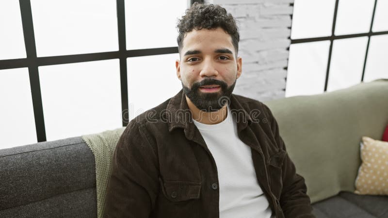 Cheeky Young Man at Home Puffing Cheeks with Air, Making Hilarious ...