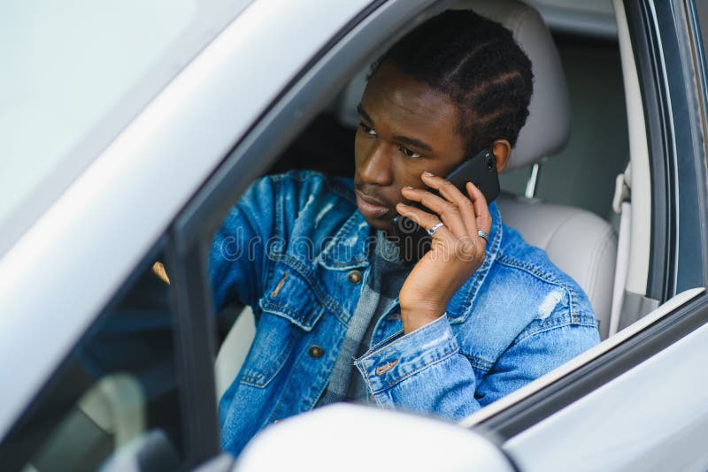 Cheerful African Man Inside His New Car. Stock Image - Image of looking ...