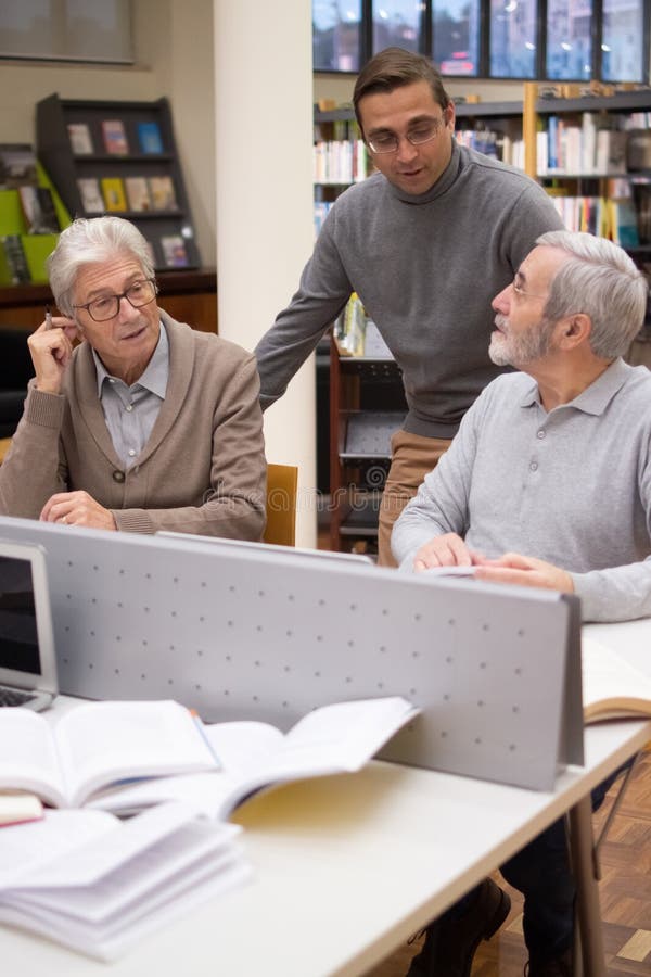 Cheerful Aged People Studying Modern Technologies Stock Photo - Image ...