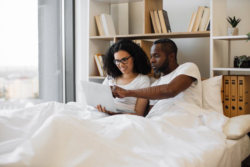 Amorous People Spending Time Together Using Laptop in Bed Stock Photo ...
