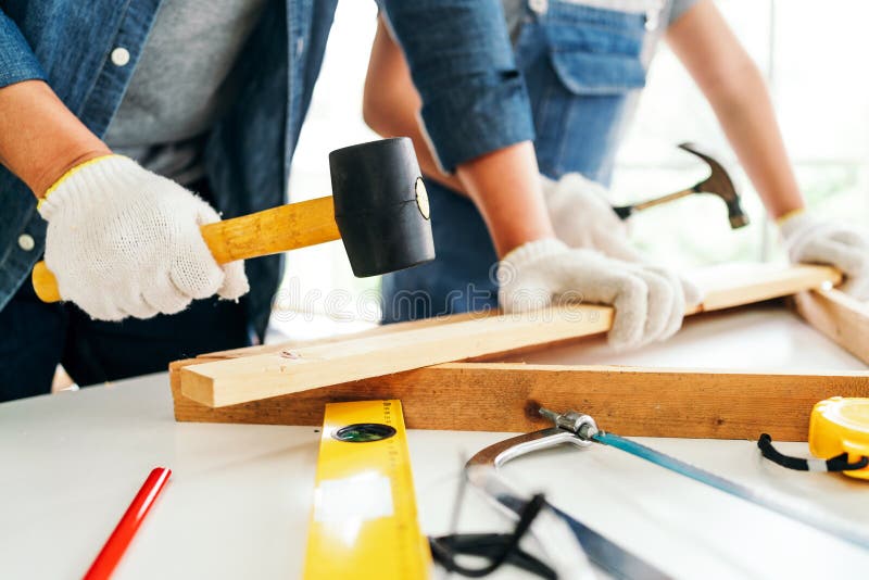 Cheerful Asian Carpentry Father Discusses and Teaches His Son about ...