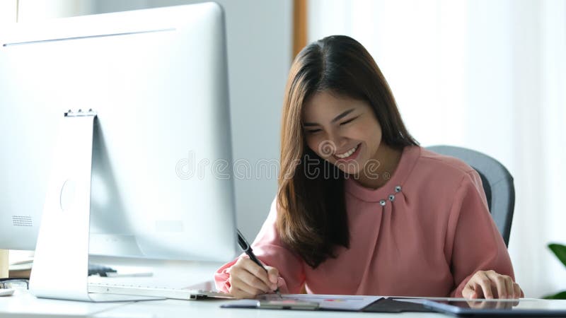 Cheerful Asian Woman Entrepreneur Watching Online Webinar on Computer ...