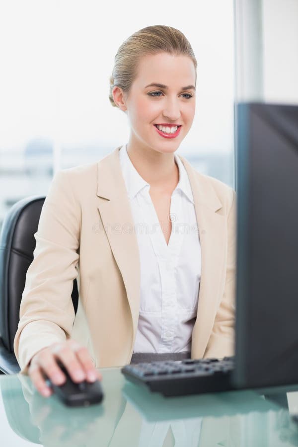 Cheerful Attractive Businesswoman Working on Her Computer Stock Image ...