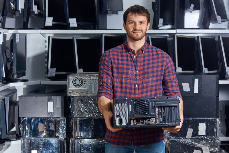 Cheerful Attractive Man Holding a System Unit and Looking at the Camera ...