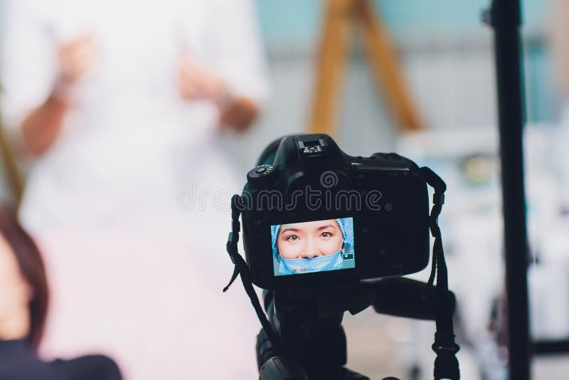 Cheerful Beautiful Woman Doctor Recording Vlog Video about Medicine and ... Cheerful Beautiful Woman Doctor Recording Vlog Video about Medicine and ...