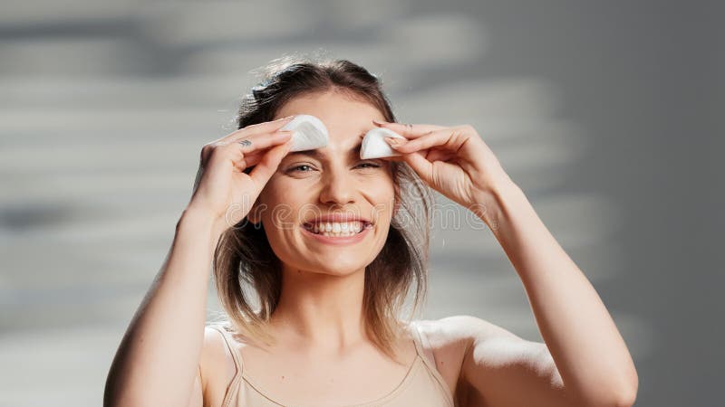 Cheerful Beauty Model Playing with Cotton Pads on Camera Stock Image ...