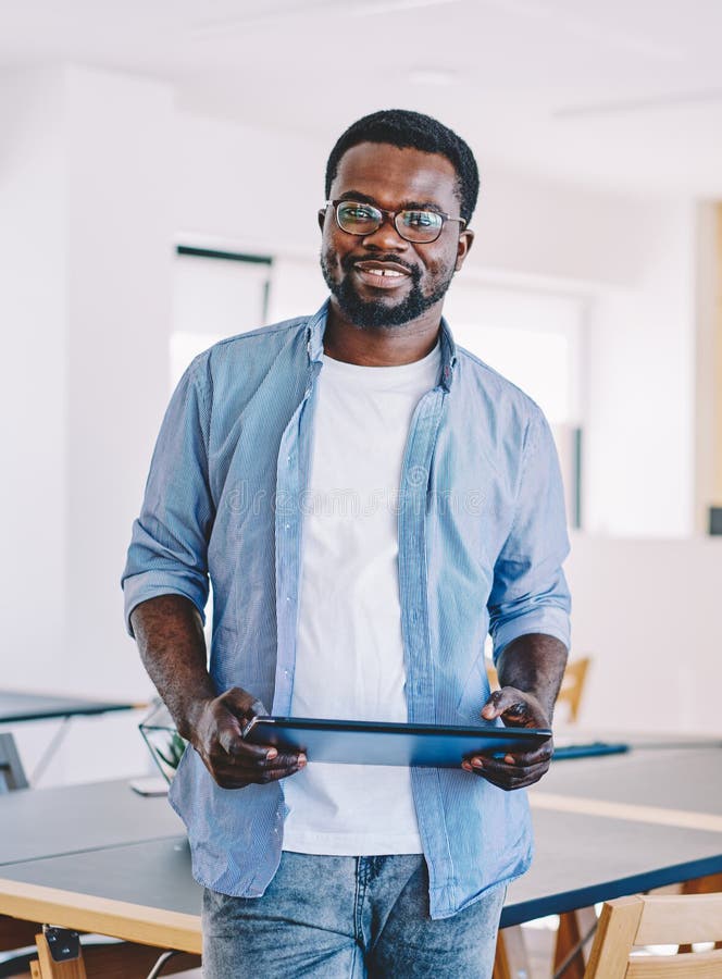 Cheerful Black Man with Tablet in Classroom Looking at Camera Stock ...