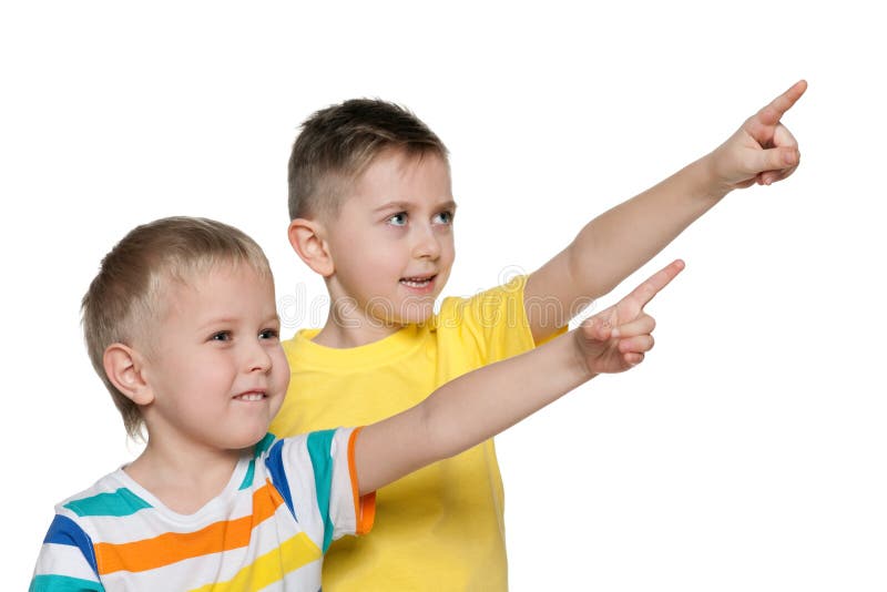Cheerful Boys Pointing Aside Stock Photo - Image of caucasian, single ...