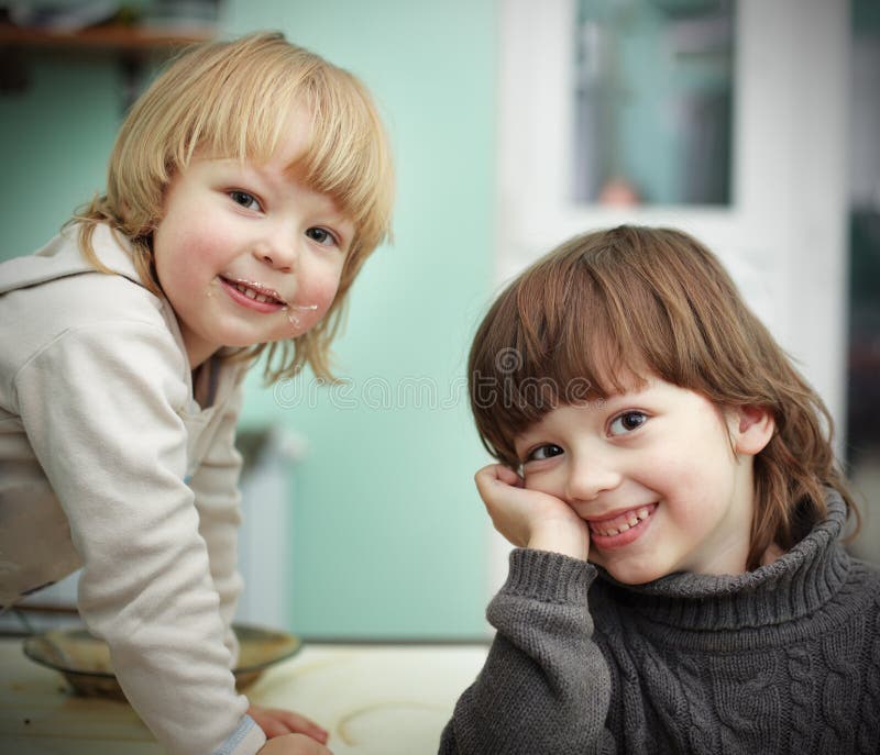 Cheerful Brother on the Kitchen Table Stock Photo - Image of people ...