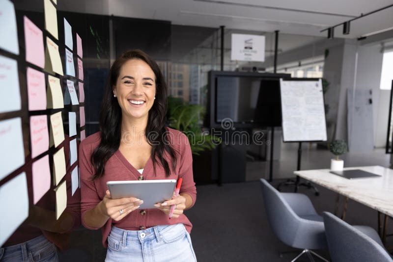 Cheerful Business Project Leader Standing at Board with Sticky Notes ...