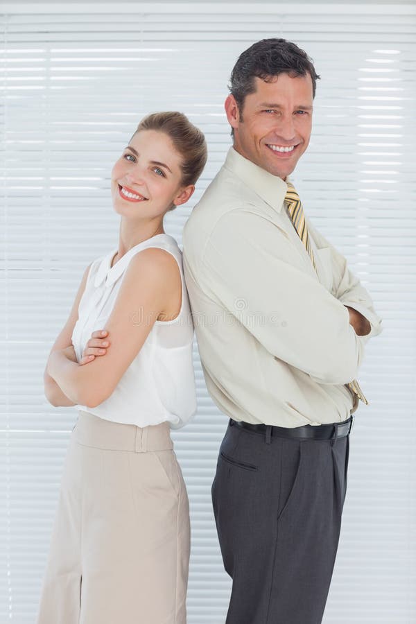 Cheerful Business Team Posing Back To Back Stock Image - Image of ...