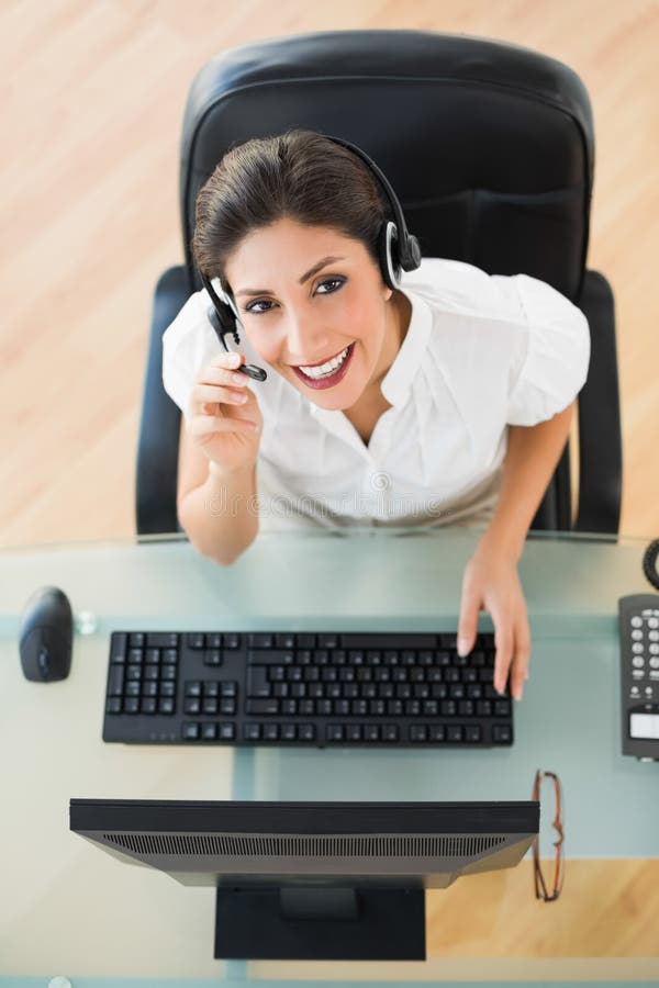 Call Center Agent Typing while on a Call Stock Photo - Image of ...