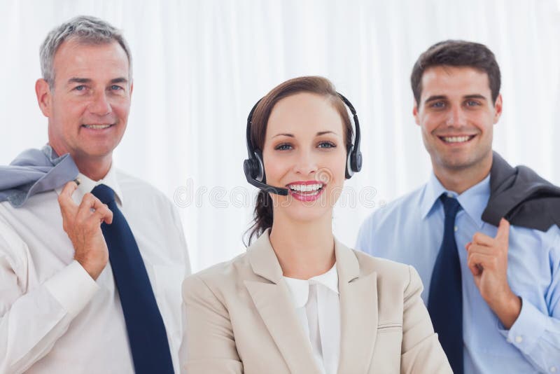 Cheerful Call Center Agent Posing with Her Work Team Stock Image ...