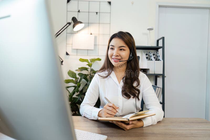 Call Center Agent Headset Taking Notes Stock Photos - Free & Royalty ...