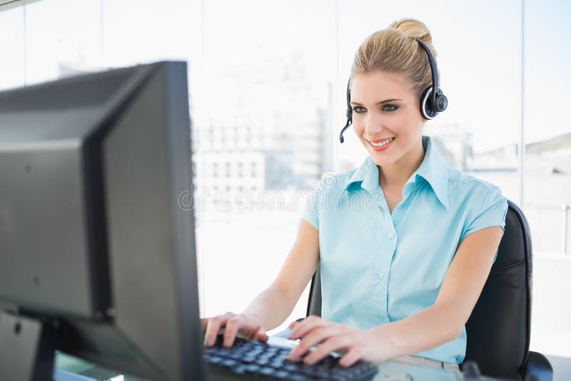 Cheerful Call Centre Agent Working on Computer Stock Image - Image of ...