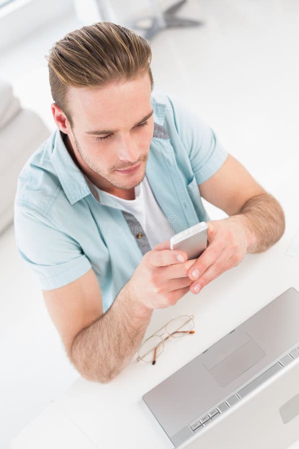 Cheerful Casual Businessman Text Messaging Stock Image - Image of glass ...
