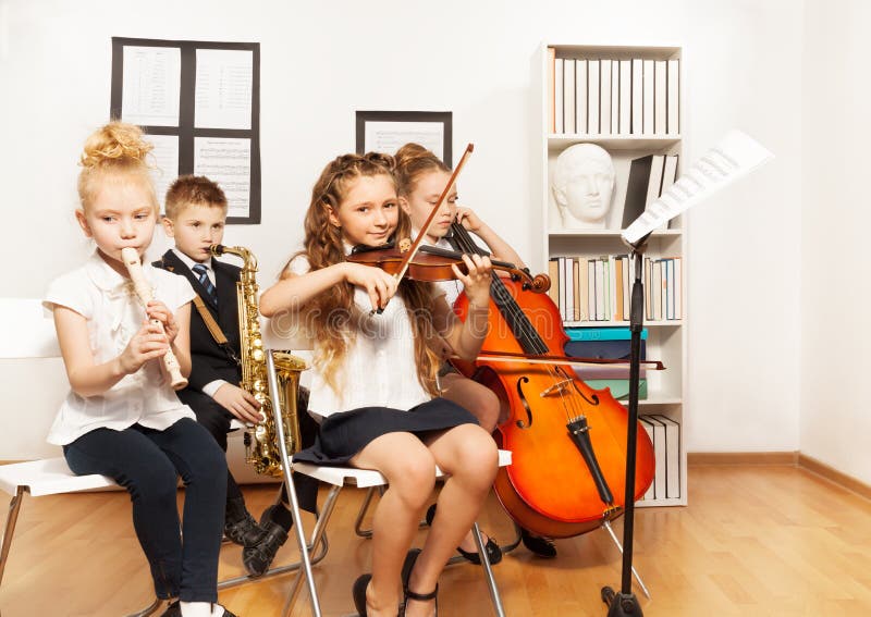 Cheerful Children Playing Musical Instruments Stock Photo - Image of ...
