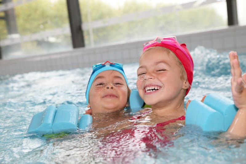 Cheerful Children Playing in Swimming Pool Stock Photo - Image of kids ...