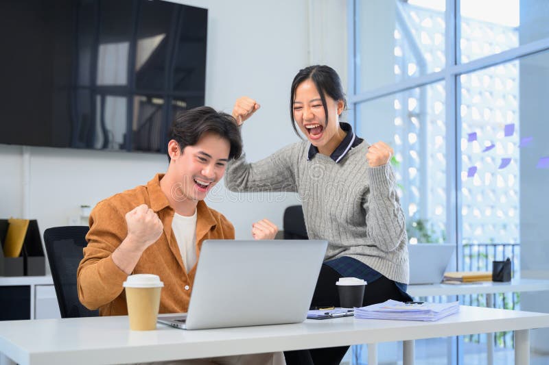 Cheerful Colleagues Expressing Excitement and Success after Completing ...