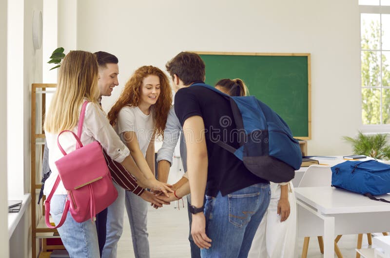 Cheerful College or High School Students Together Making Stack of Hands ...