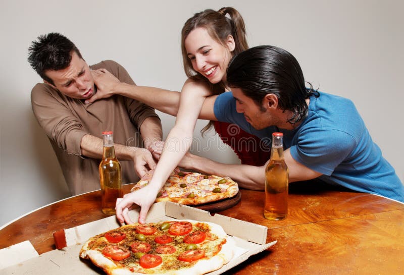 The Cheerful Company of Youth Eating a Pizza Stock Photo - Image of ...