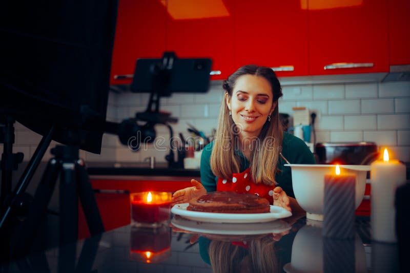 Food Vlogger Presenting and Filming a Chocolate Cake Recipe Stock Photo ...