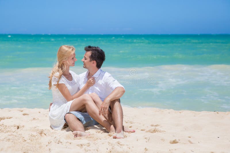 Cheerful Couple Embracing And Posing On The Beach Stock Image Image