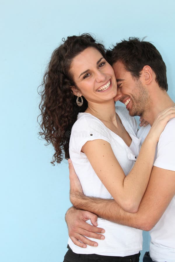 Cheerful couple hugging stock image. Image of beautiful - 24158695