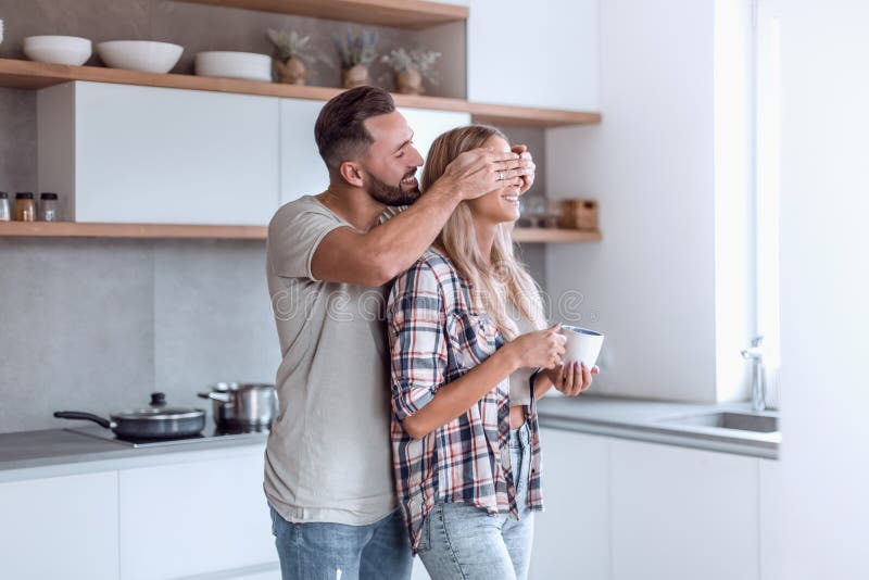 Cheerful Couple in the Kitchen on a Good Morning Stock Image - Image of ...