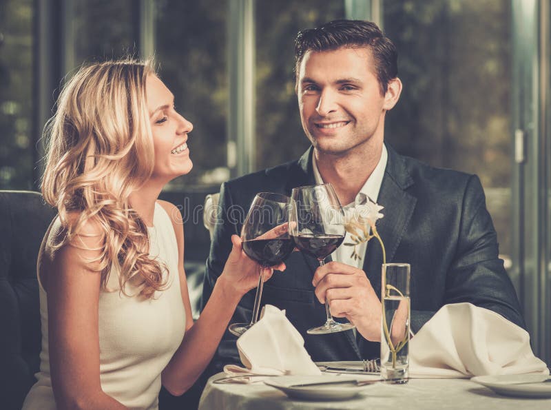 Cheerful Couple in a Restaurant Stock Image - Image of fashion, girl ...