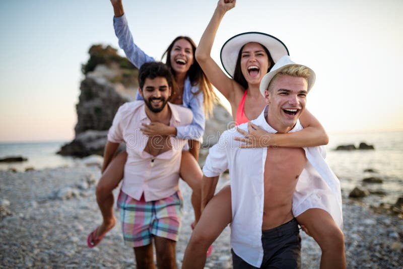 Cheerful Friends Enjoying Weekend and Having Fun on Beach Stock Image ...