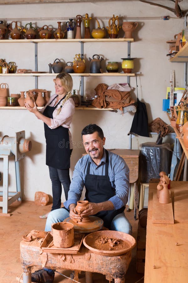 Cheerful Craftsman Making Pot Using Pottery Wheel Stock Photo - Image ...