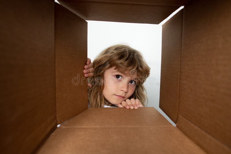 Cheerful Cute Child Opening a Present. View from Inside of the Box ...