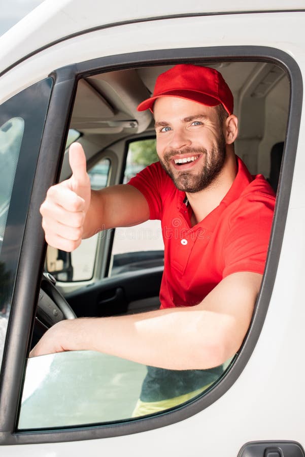 Cheerful Delivery Man in White Van Showing Stock Image - Image of ...