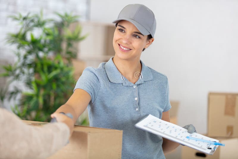 Cheerful Delivery Woman Shaking Hand Client Stock Photo - Image of ...