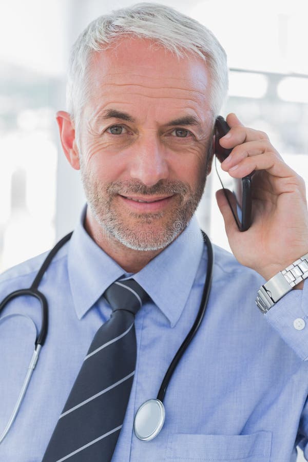 Cheerful Doctor Dring an Appointment Stock Image - Image of cheerful ...