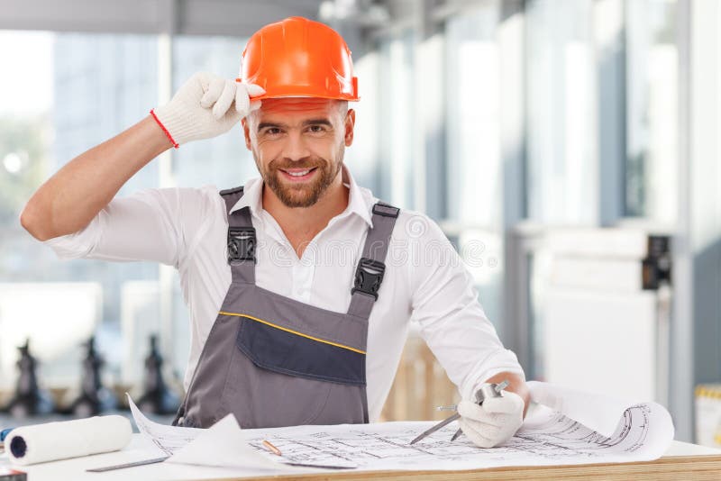 Cheerful Engineer is Creating Plan of Building Stock Photo - Image of ...