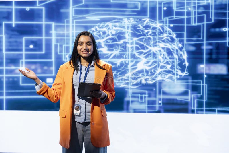 Cheerful Engineer Holding Presentation at AI Tech Summit Using Tablet ...