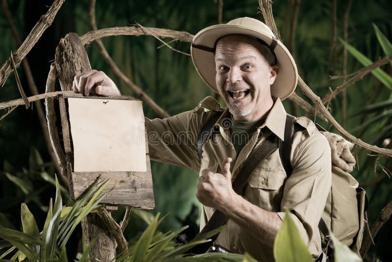 Cheerful Explorer with Sign Stock Image - Image of outdoors, foliage ...