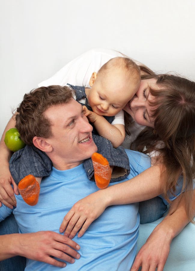 Cheerful family stock photo. Image of family, apple, year - 21926464