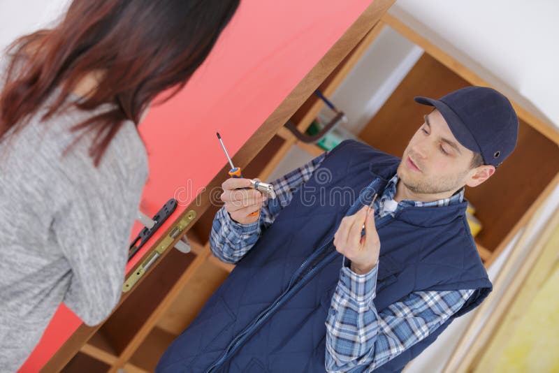 Cheerful Female Client Needs Professional Help Electrician at Home ... Cheerful Female Client Needs Professional Help Electrician at Home ...